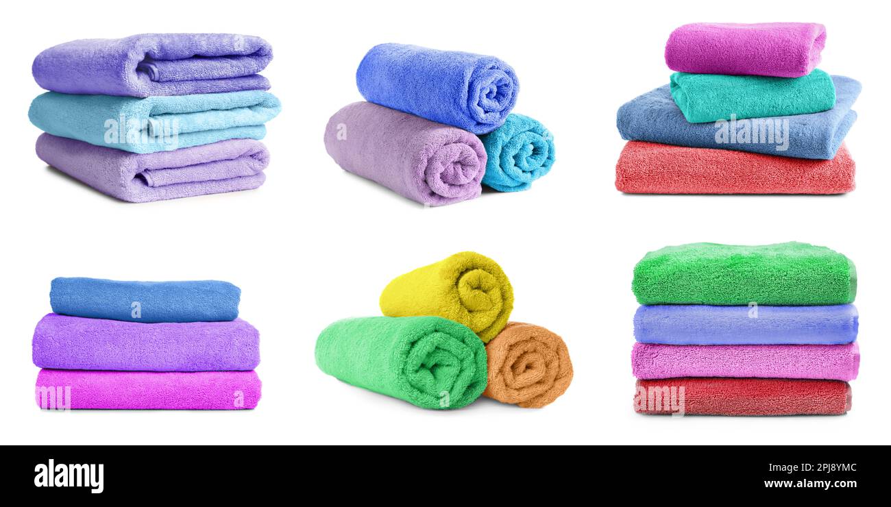 Set with different colorful towels on white background Stock Photo - Alamy