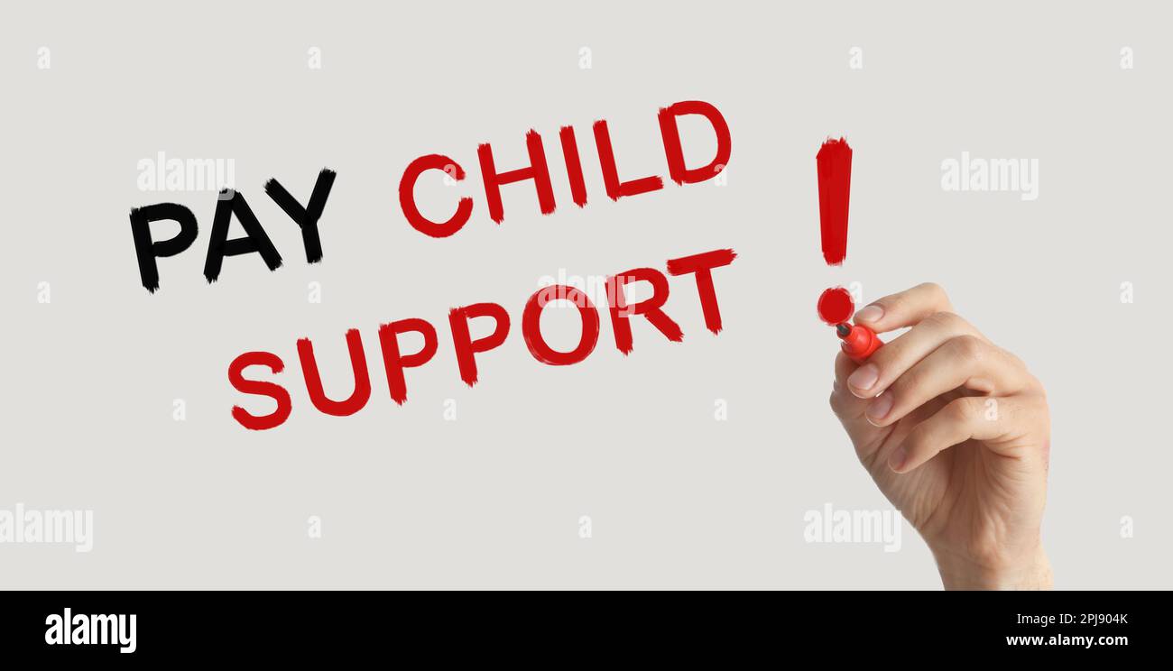 Woman with marker and phrase PAY CHILD SUPPORT! on beige background ...