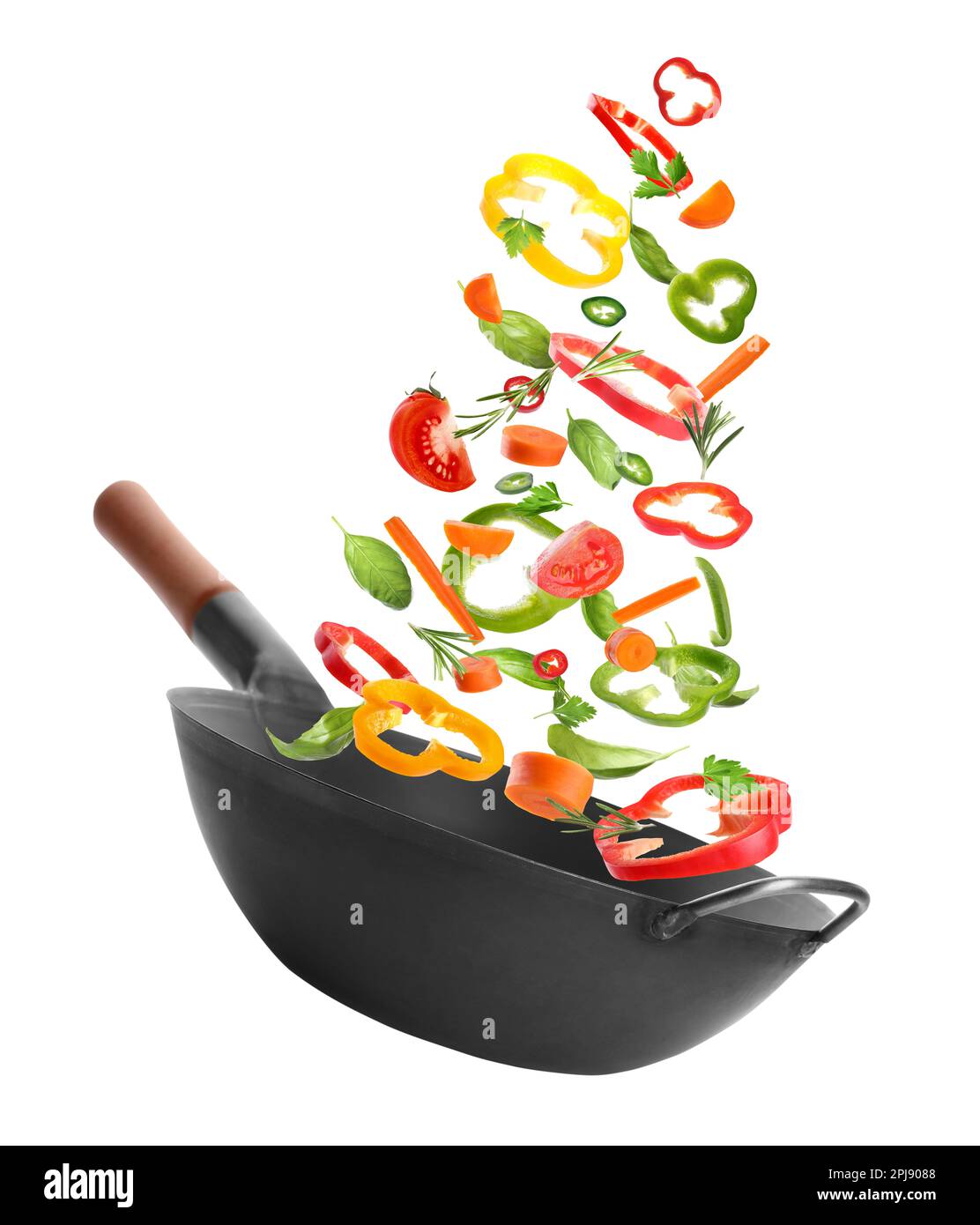 Different tasty ingredients falling into wok on white background Stock ...