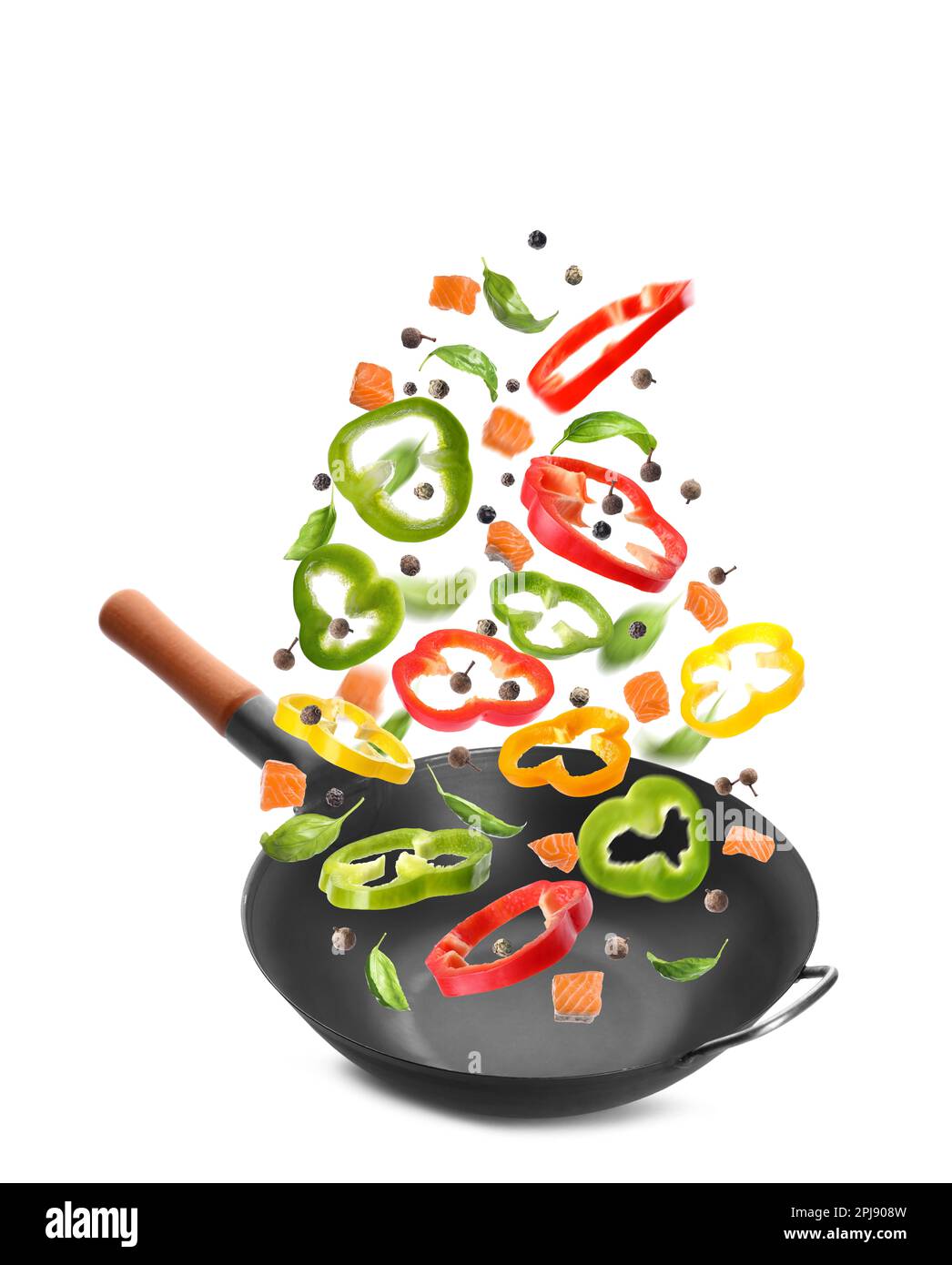 Different tasty ingredients falling into wok on white background Stock ...