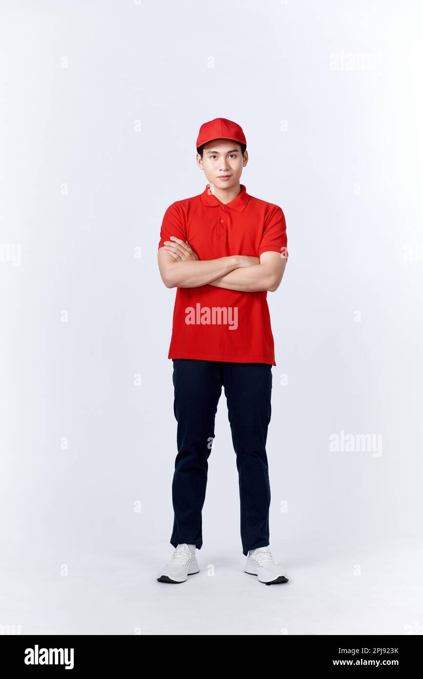 Asian Man in Blue Uniform. White Background Stock Photo - Alamy