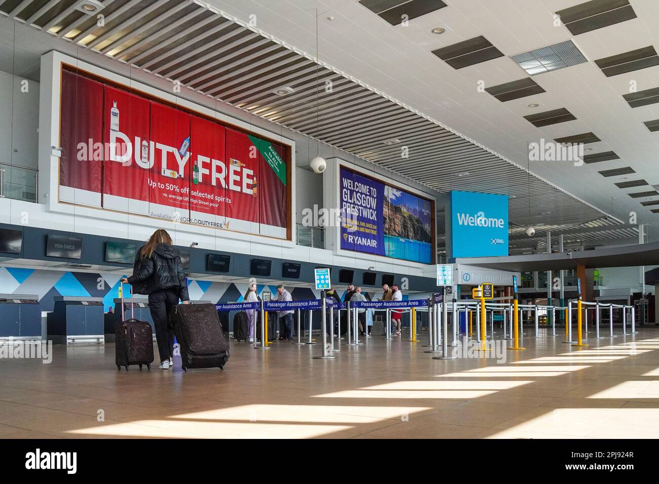 Ticket desks in the main concourse at Prestwick International Airport ...