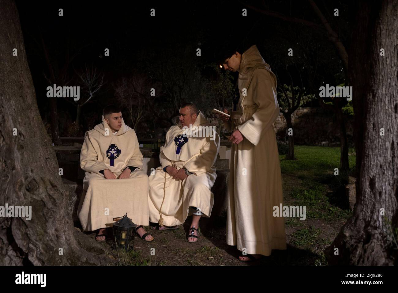 Members of the brotherhood in the preparation of the processional step ...