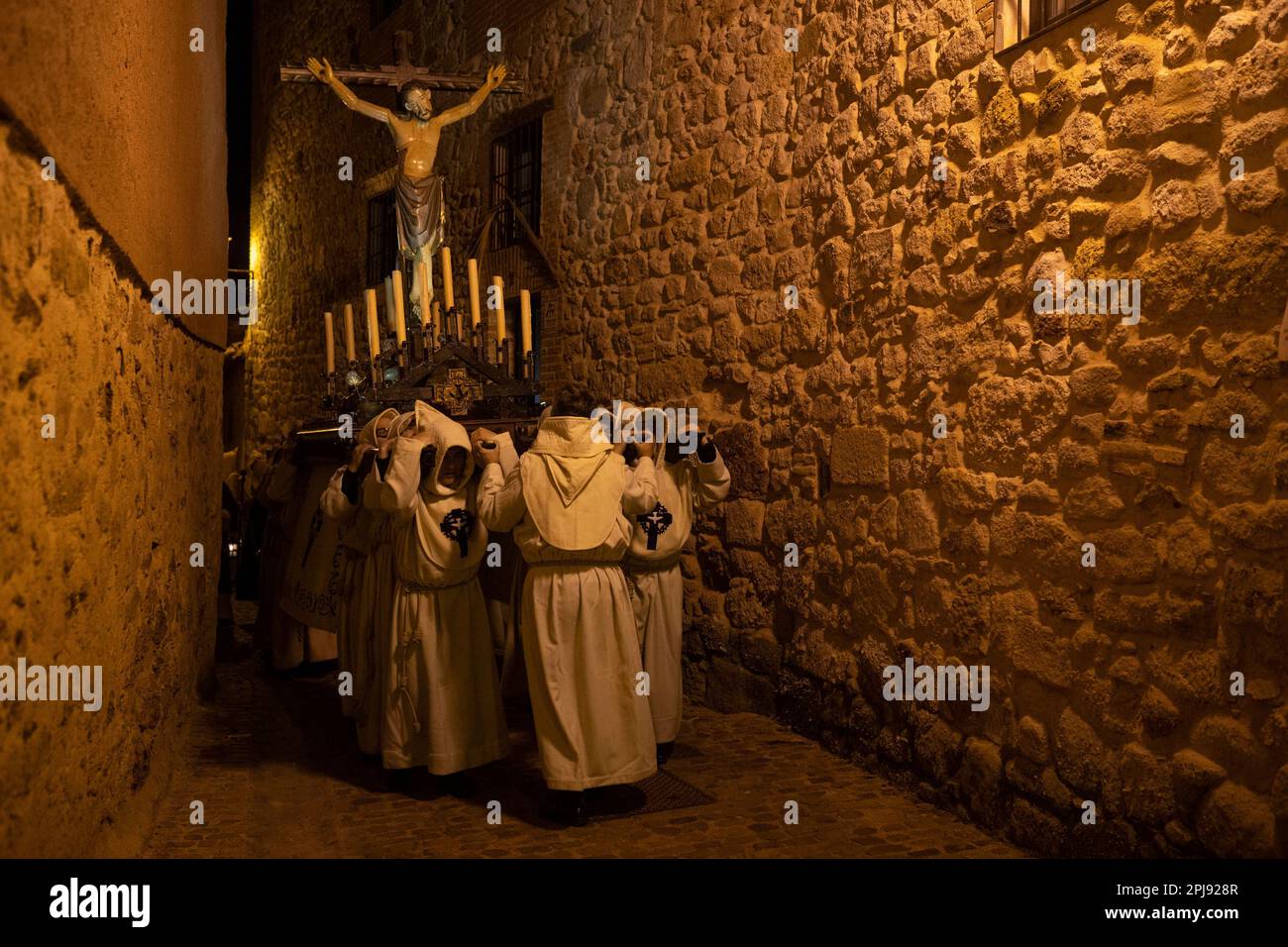 Members of the brotherhood in the preparation of the processional step ...