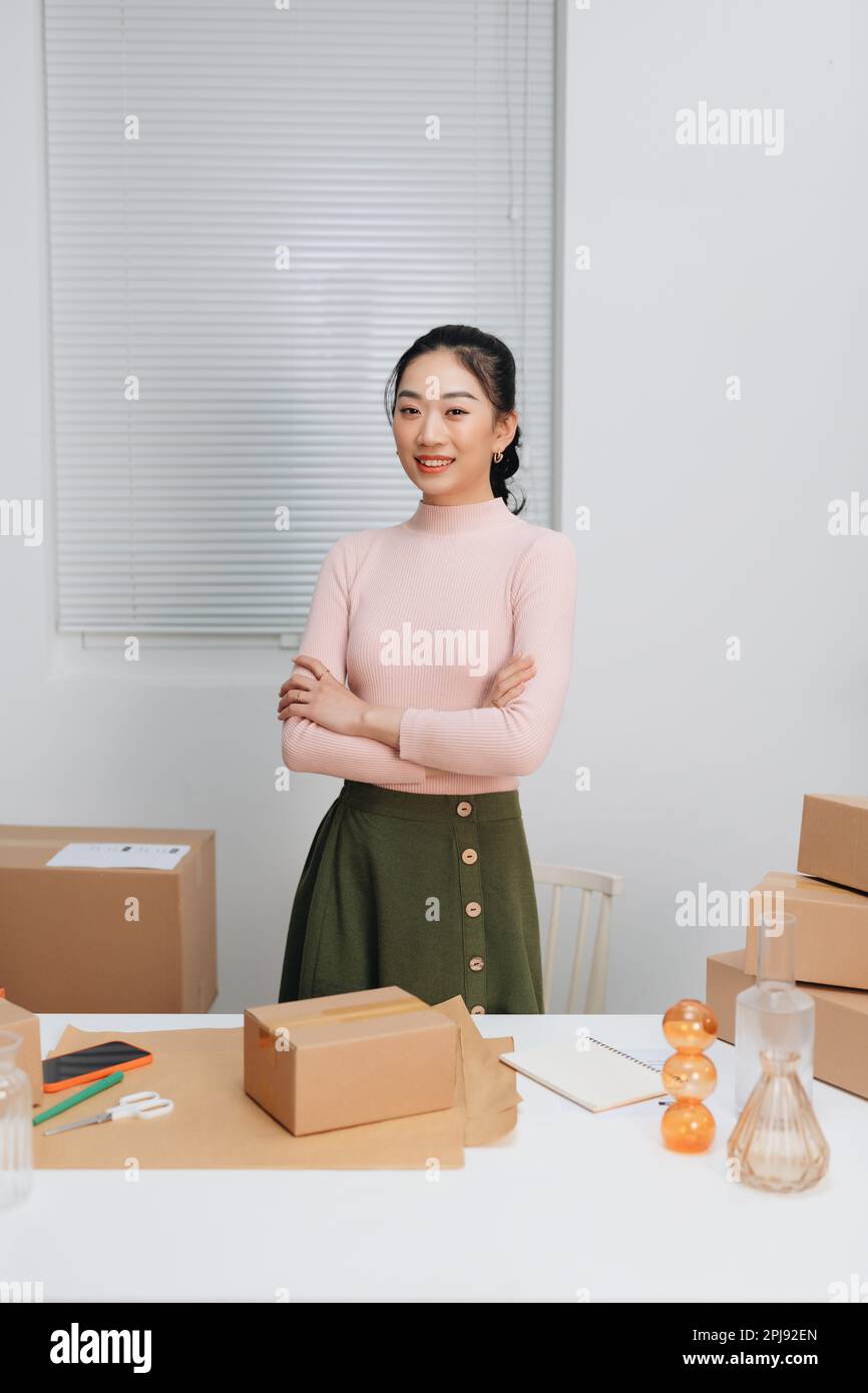 girl owner standing confident with arms crossed prepare order send to ...