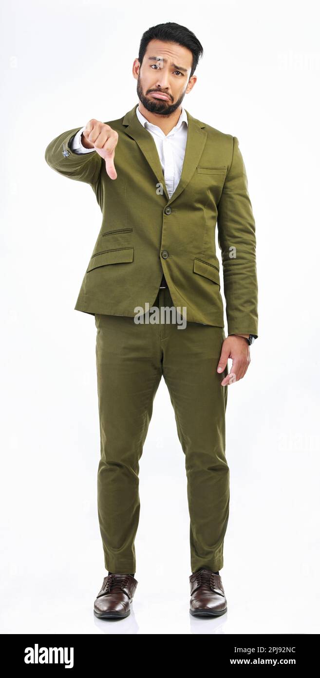 Thumbs down, sad man and reject portrait in a studio with bad feedback ...