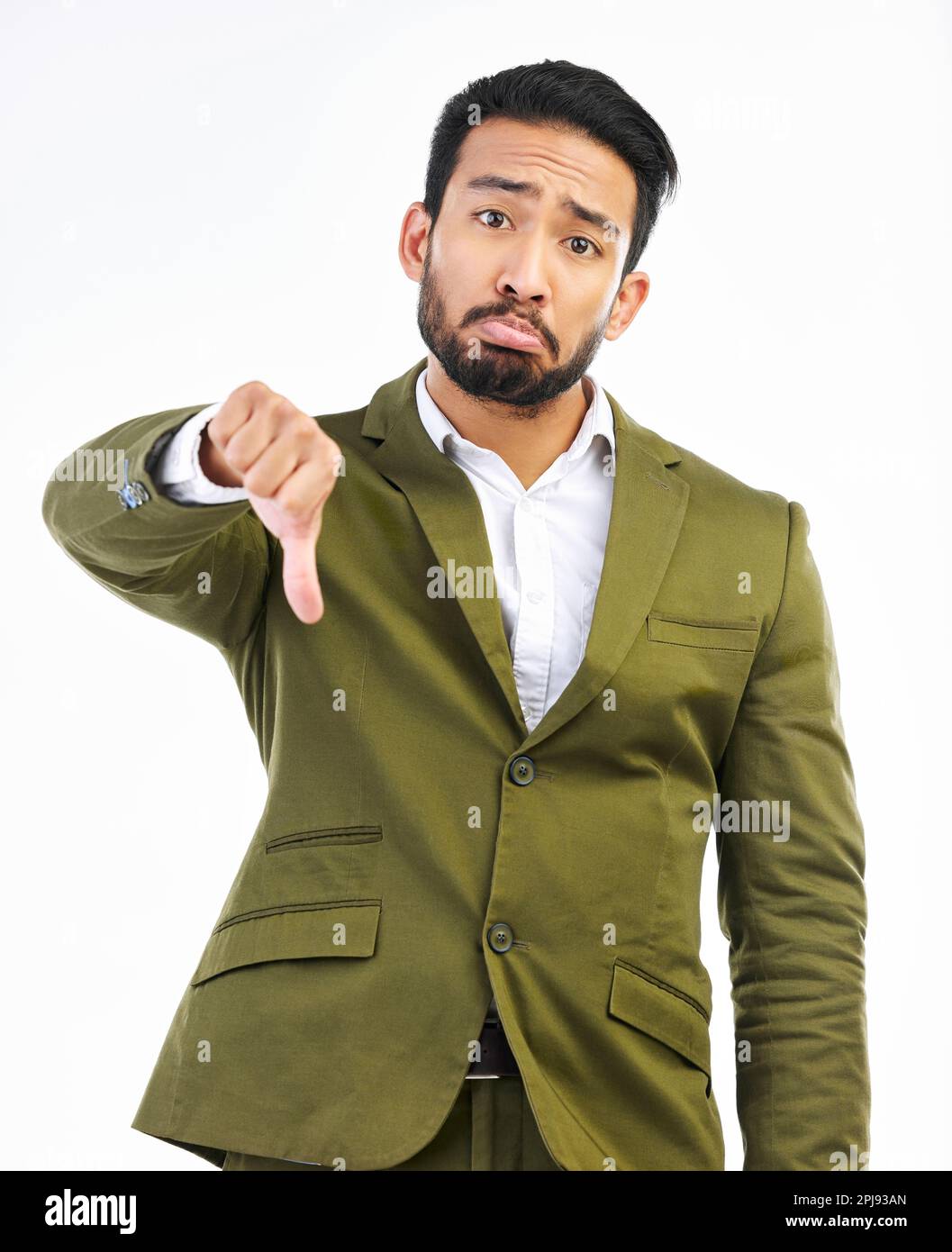 Thumbs down, sad man and portrait in a studio with bad feedback, voting ...
