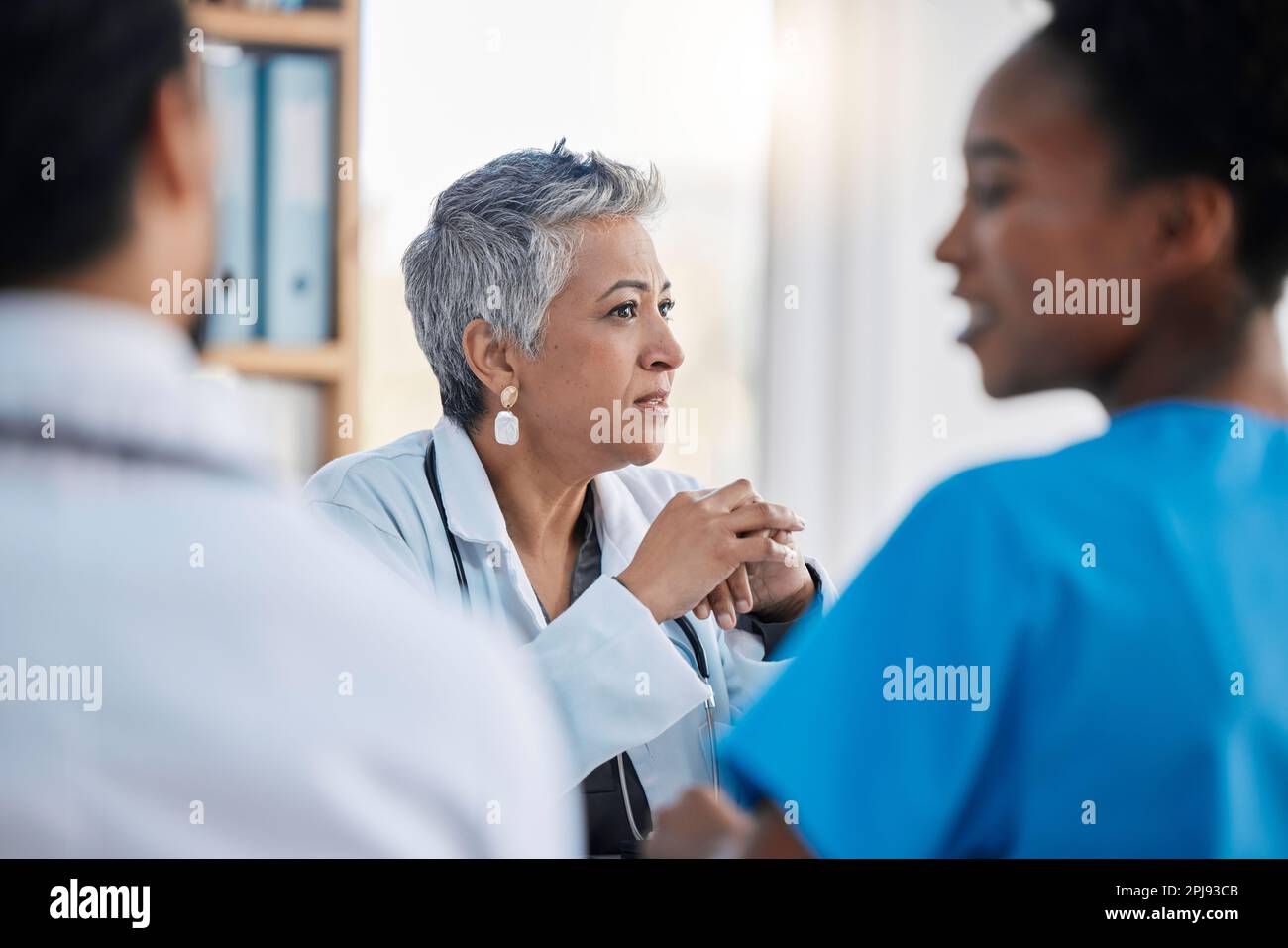 Discussion, hospital and doctors team in meeting for medical strategy ...