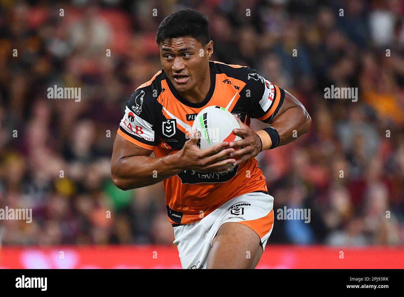 Stefano Utoikamanu of the Tigers makes a run during the NRL Round 5 ...