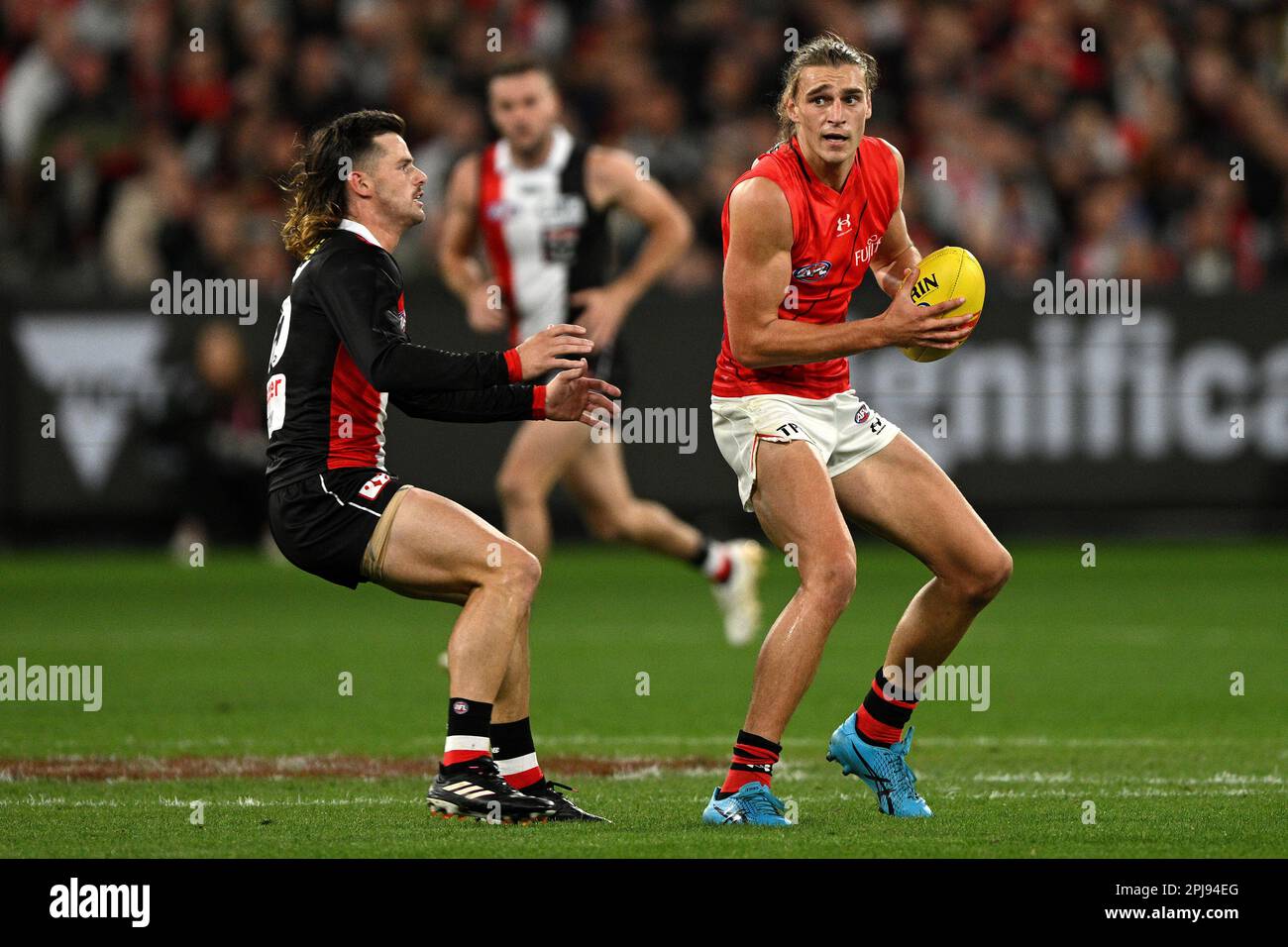 Harrison Jones of the Bombers takes possession of the ball during the ...