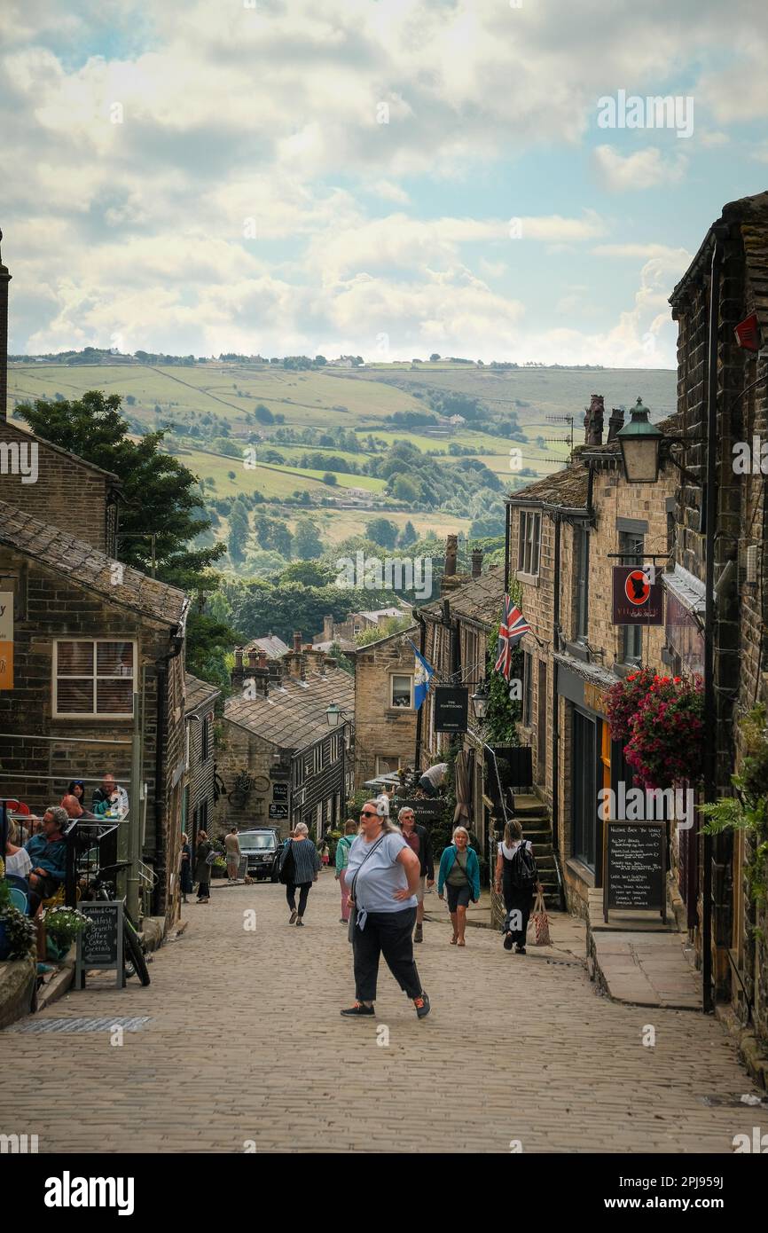 Haworth, West Yorkshire, UK. A view down Main Street in Haworth, a ...