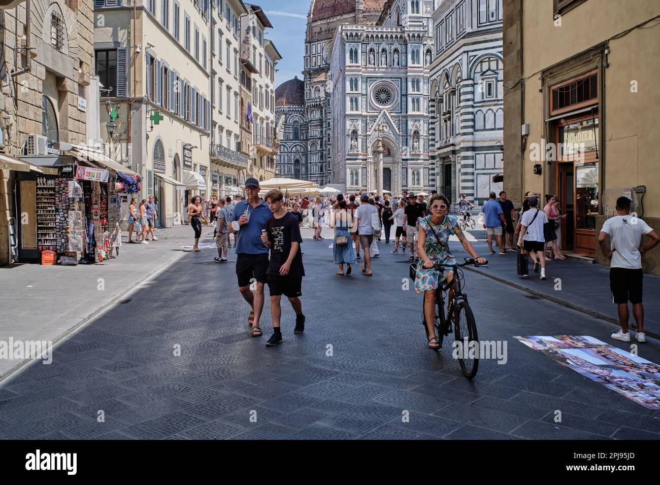 Florence, Italy - July 23 2022:Tourists on the historic streets of the ...