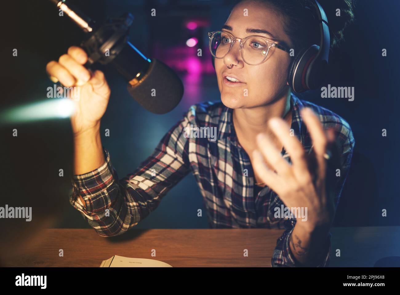 Podcast, microphone and live streaming woman speaking, advice or ...