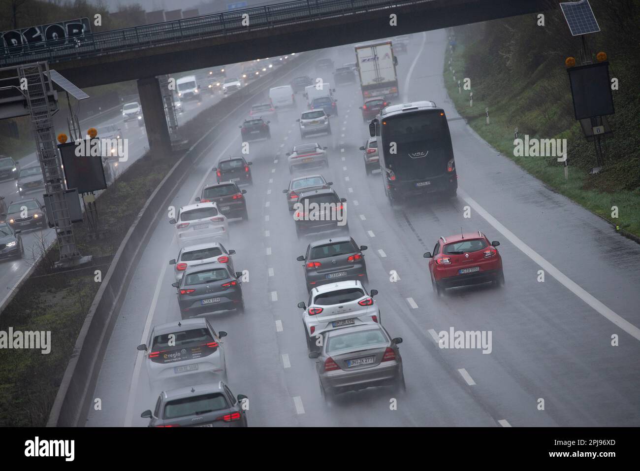 Cologne, Germany. 01st Apr, 2023. Cars drive on the Autobahn 1 near ...