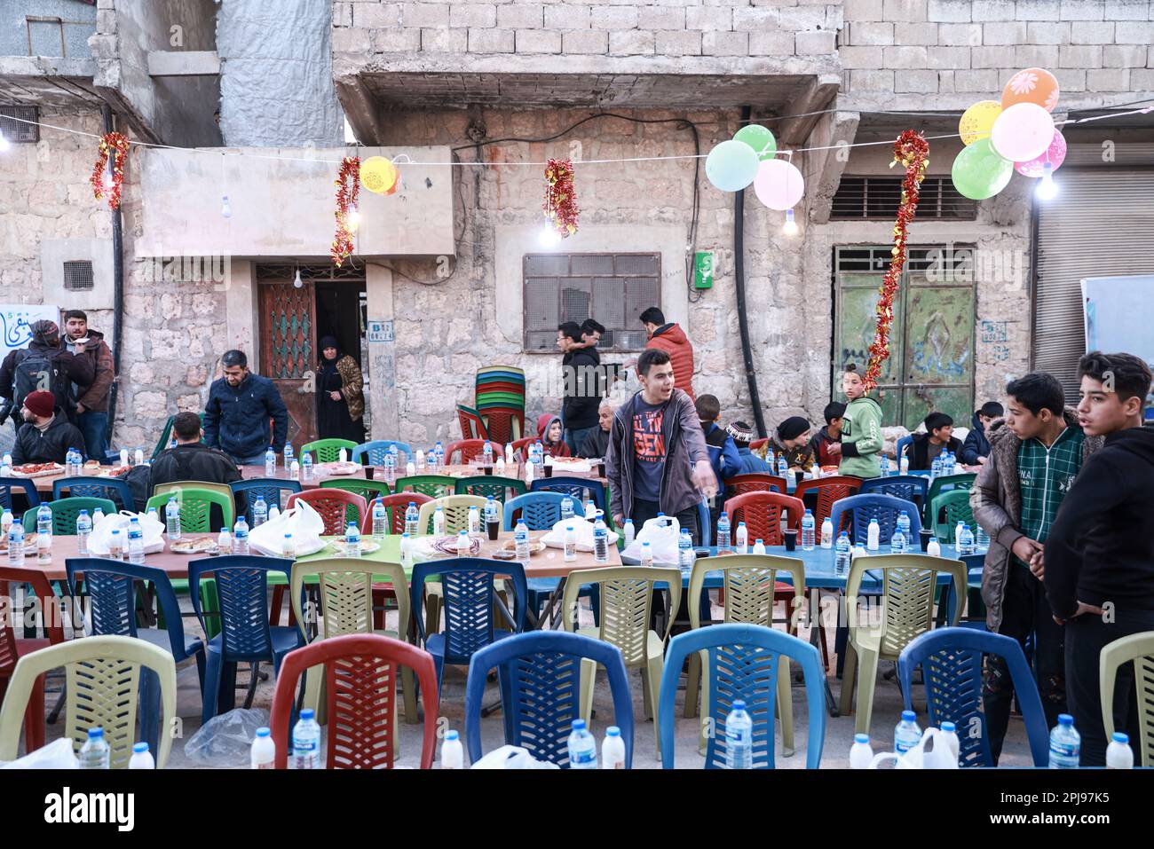 Atarib, Syria. 31st Mar, 2023. Syrian volunteers decorate a ...