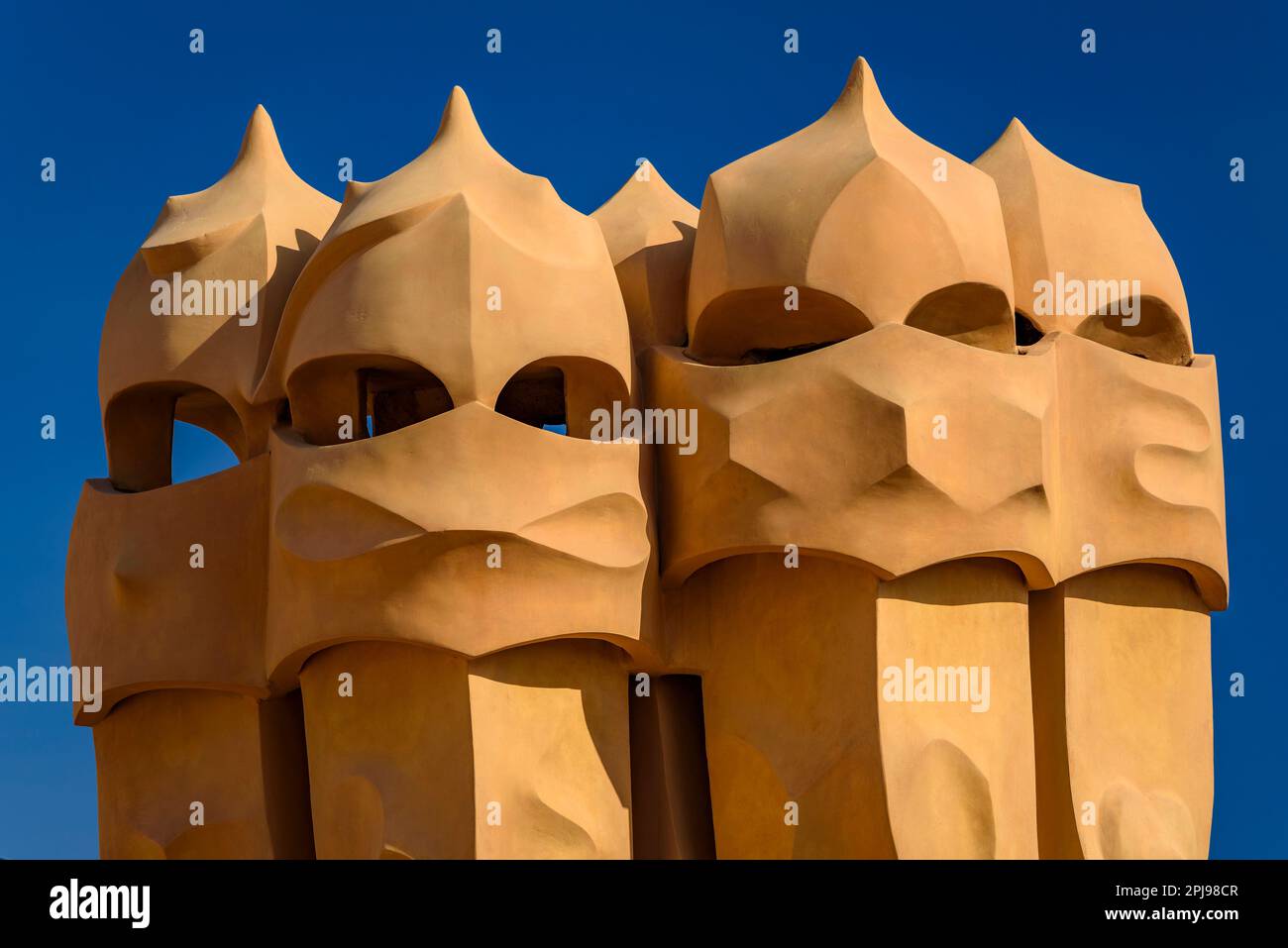 Chimneys in the shapes of soldiers / warriors on the rooftop of Casa ...
