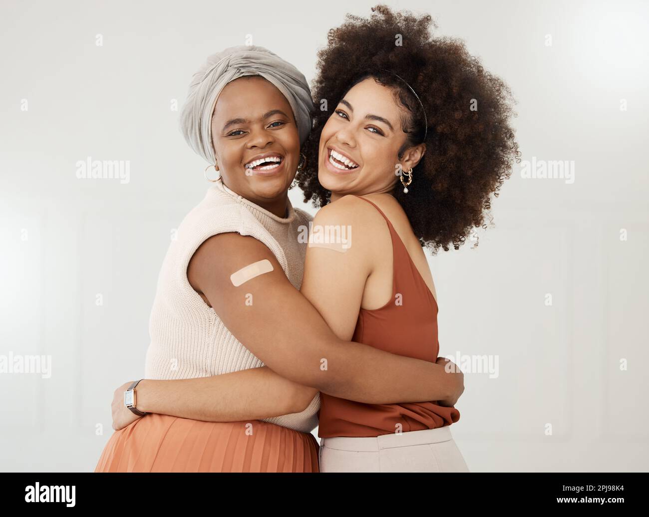 Hug, happy and portrait of women with plasters after vaccination, covid ...