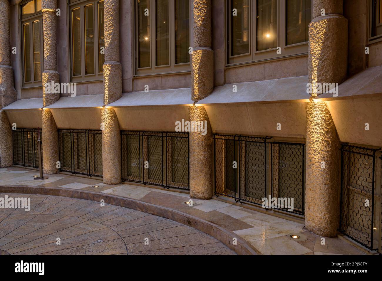 Columns of the interior courtyard of Casa Milà (La Pedrera) at dusk ...