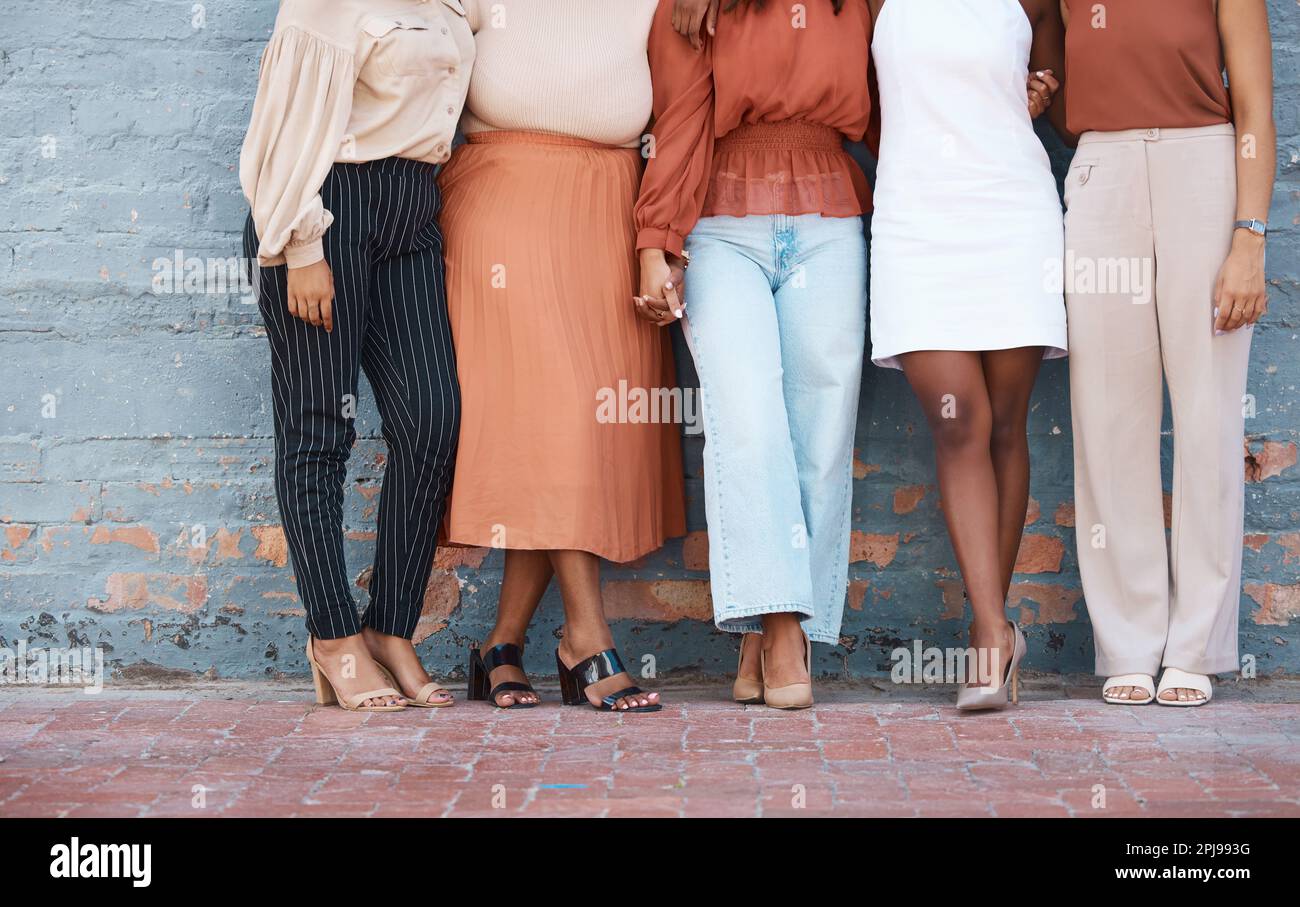 Fashion, formal and business woman legs at office against a wall in ...