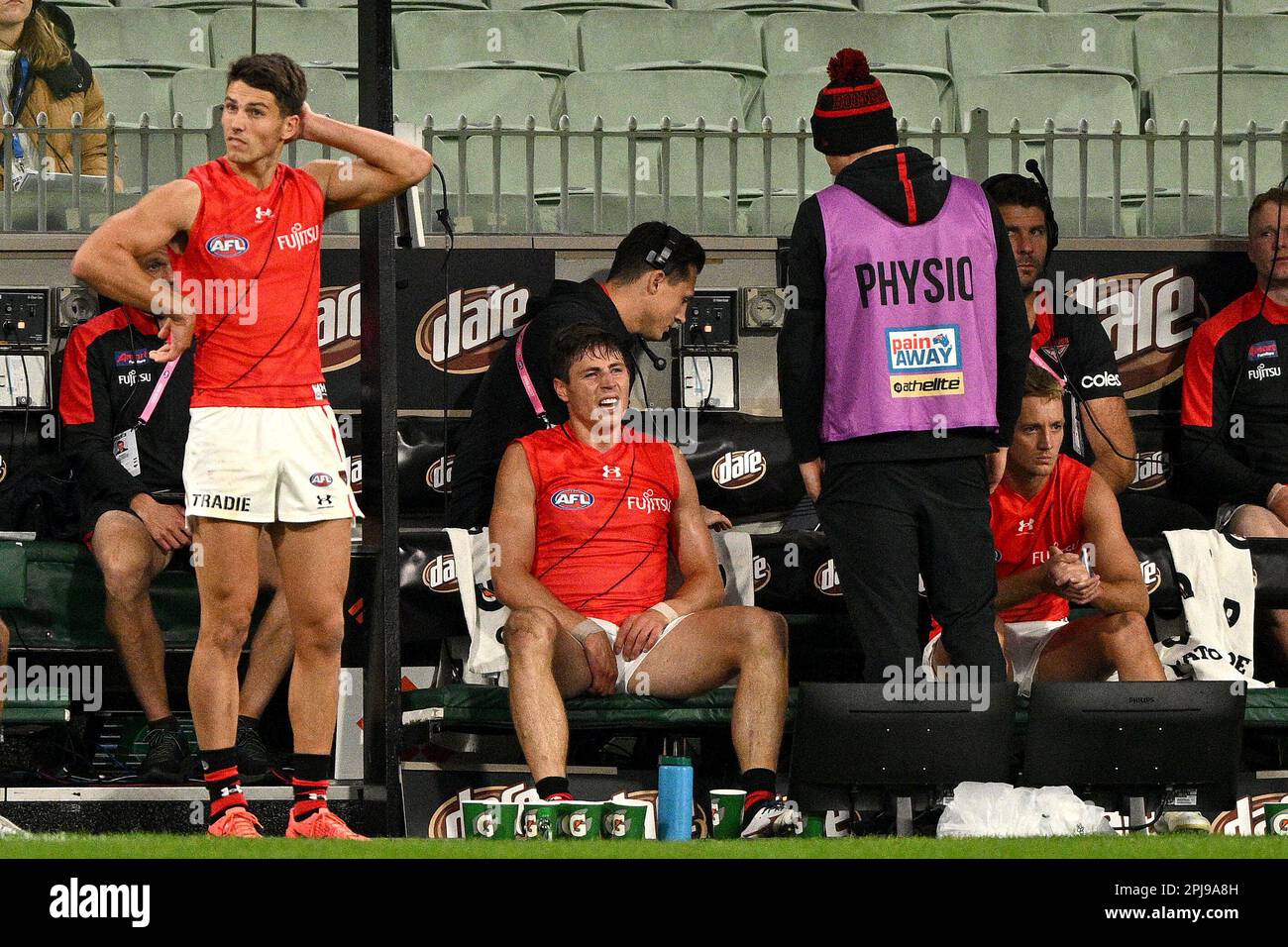 Jake Kelly of the Bombers reacts on the bench during the AFL Round 3 ...
