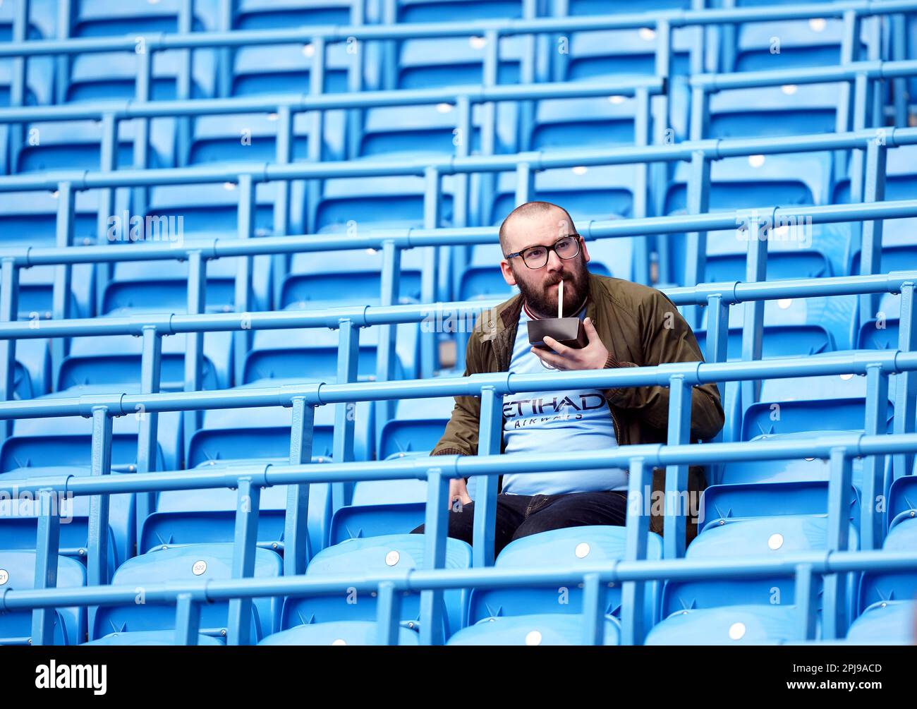 A Manchester City fan in the stands during the Premier League match at ...