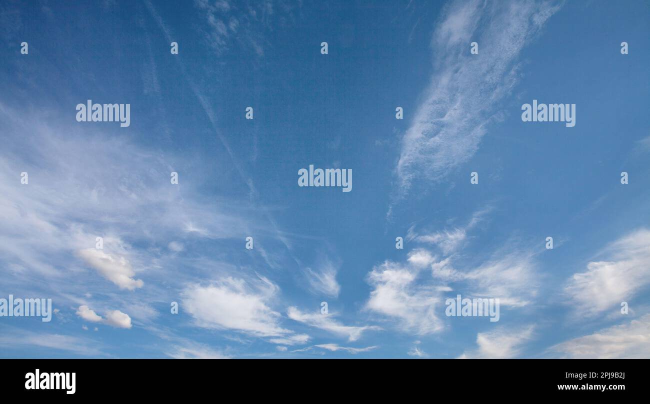Azure sky background with white clouds Stock Photo - Alamy