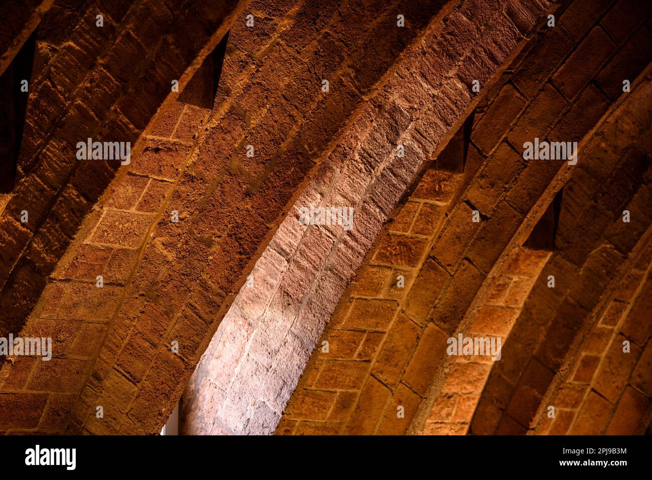 Details of catenary or parabolic arches in the attic of Casa Milà (la ...