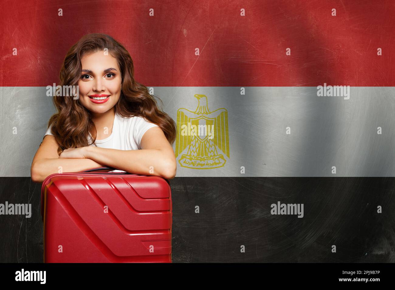 Welcome to Egypt. Cheerful woman with red suitcase on Egyptian flag background. Travel, work ...