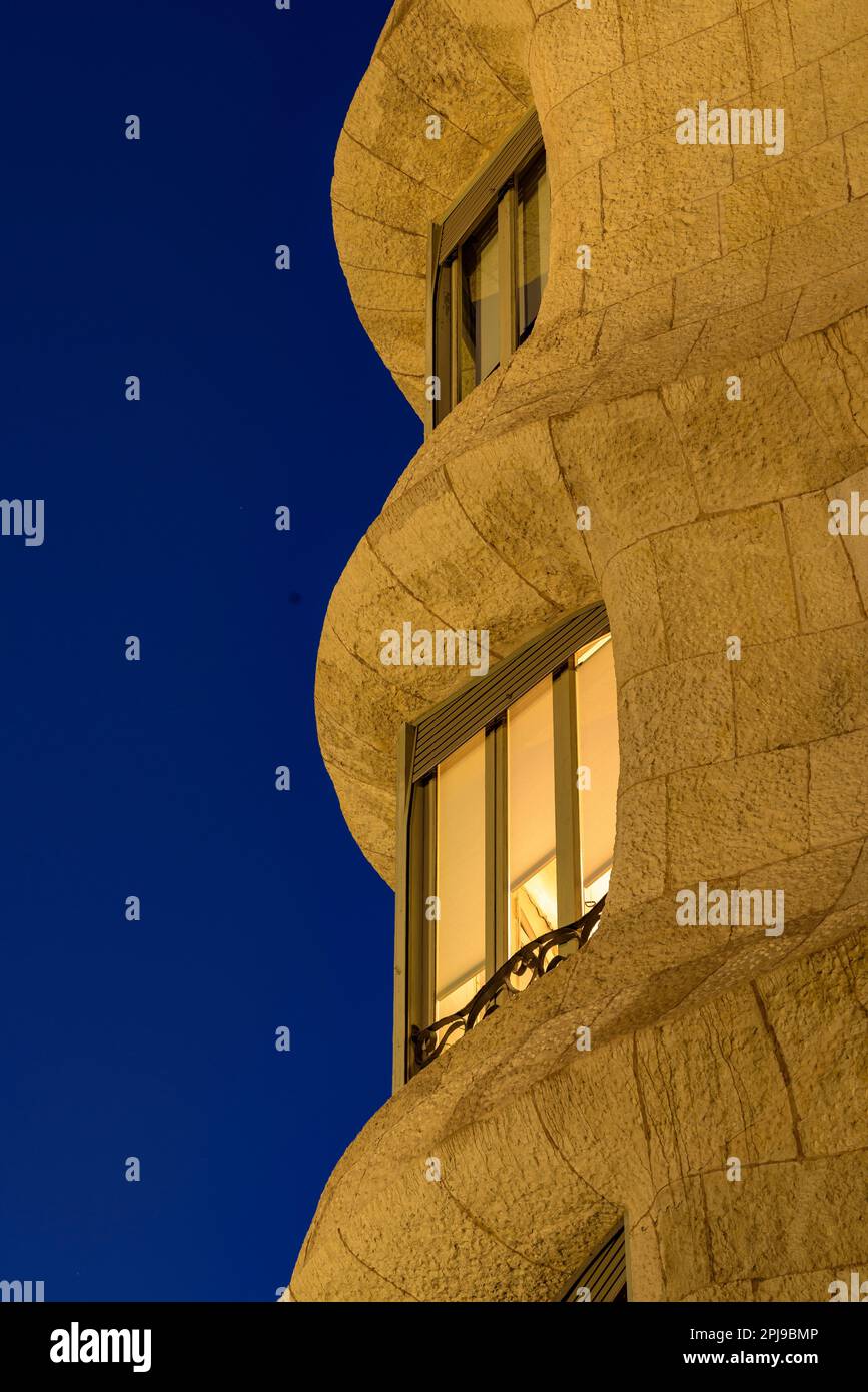 Facade of La Pedrera (Casa Milà) at twilight and night, a work of ...
