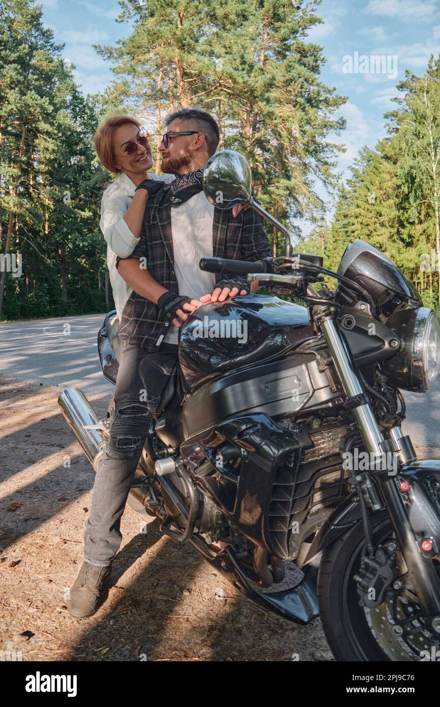Hugging on motorcycle hi-res stock photography and images - Alamy
