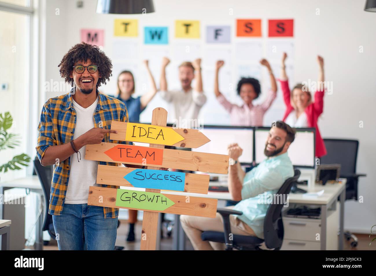 Pleasant office worker holding hi-res stock photography and images - Alamy