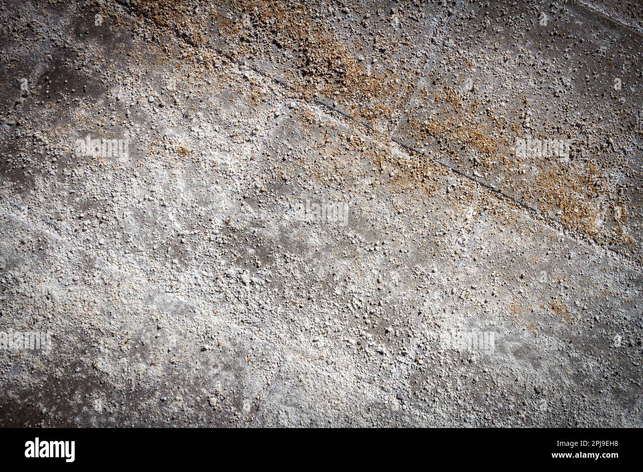 Close up of salt covered sidewalk texture. Urban environment and ...