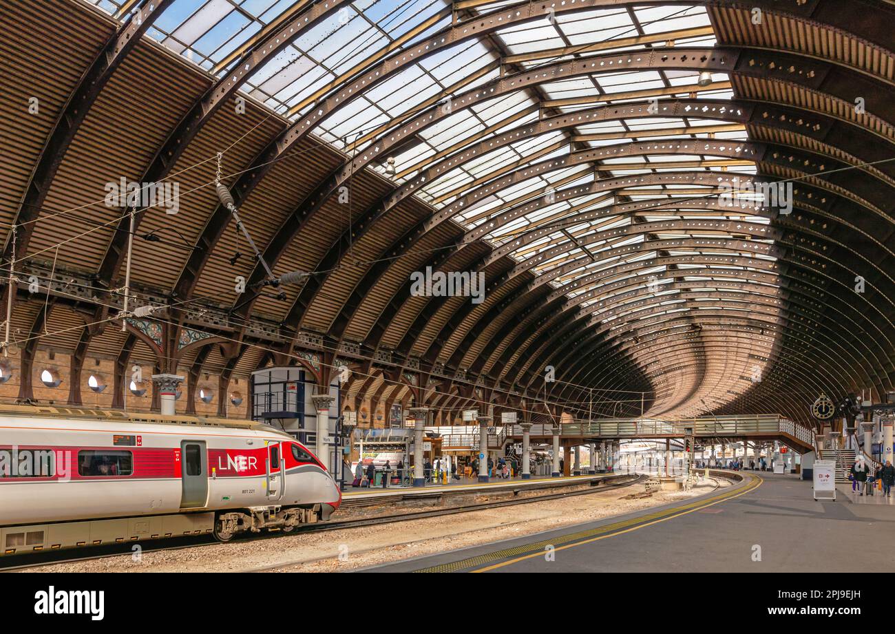 Panoramic view of a railway station with an historic ornate iron canopy ...