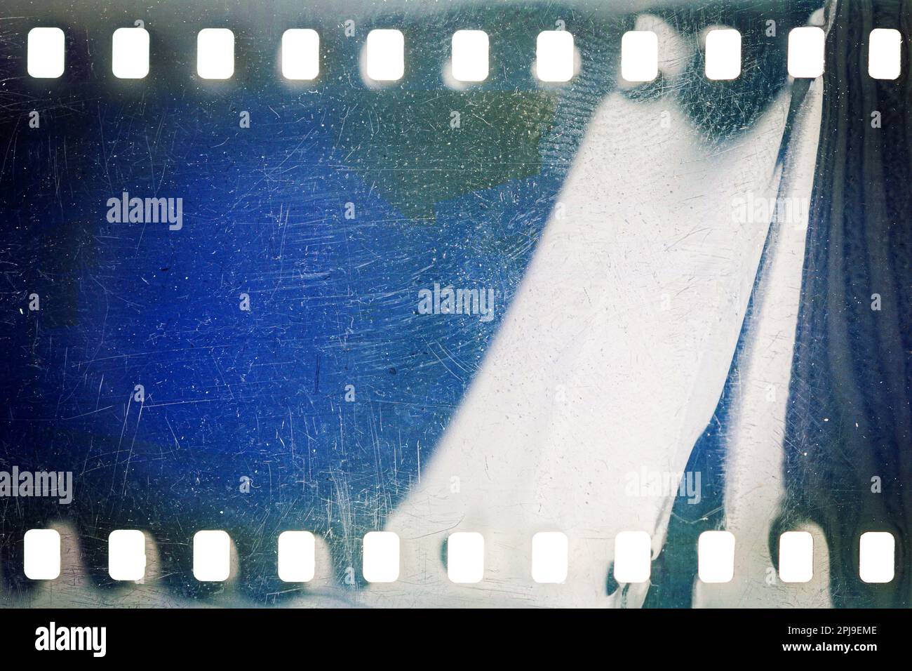 Dusty and grungy 35mm film texture or surface. Perforated scratched ...