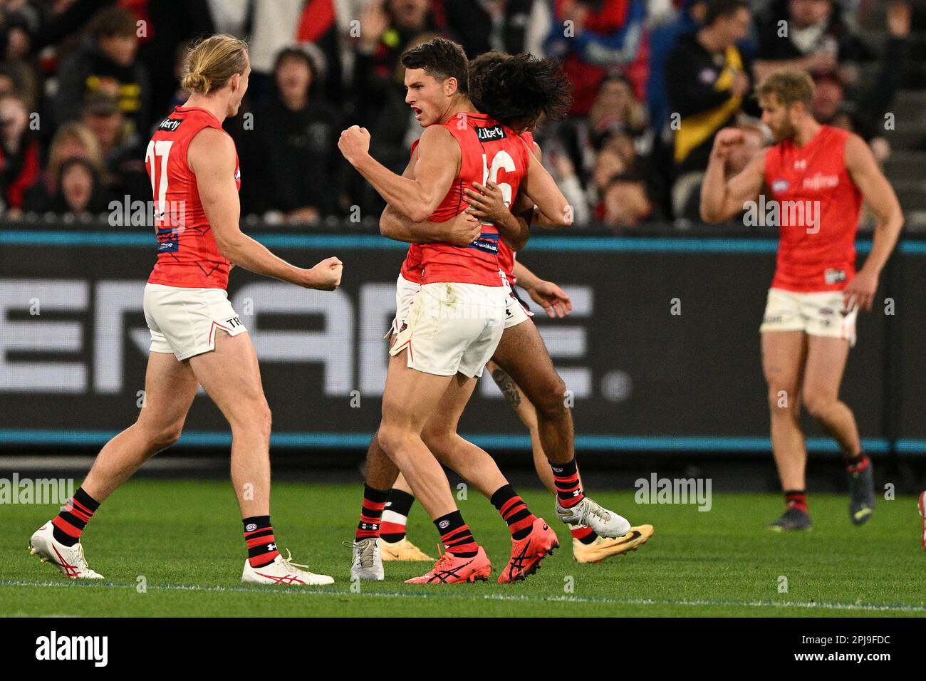Archie Perkins and Alwyn Davey Jnr of the Bombers celebrate a goal ...