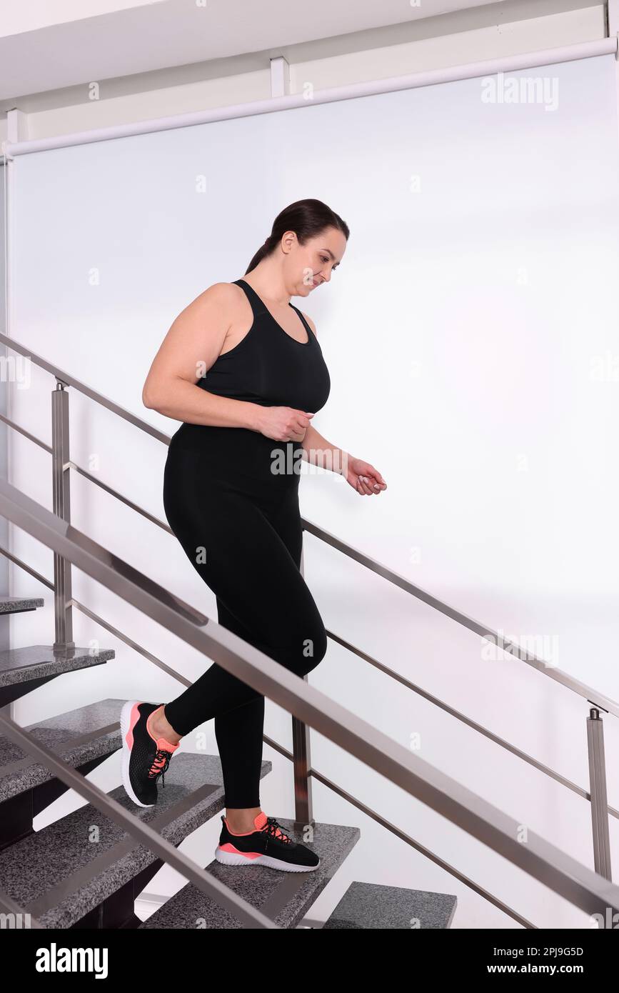 Fat woman steps hi-res stock photography and images - Alamy
