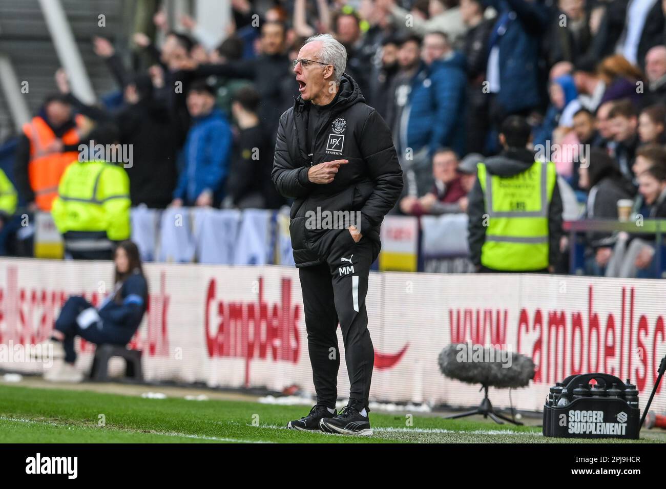 Mick McCarthy Manager of Blackpool gives his team instructions during ...
