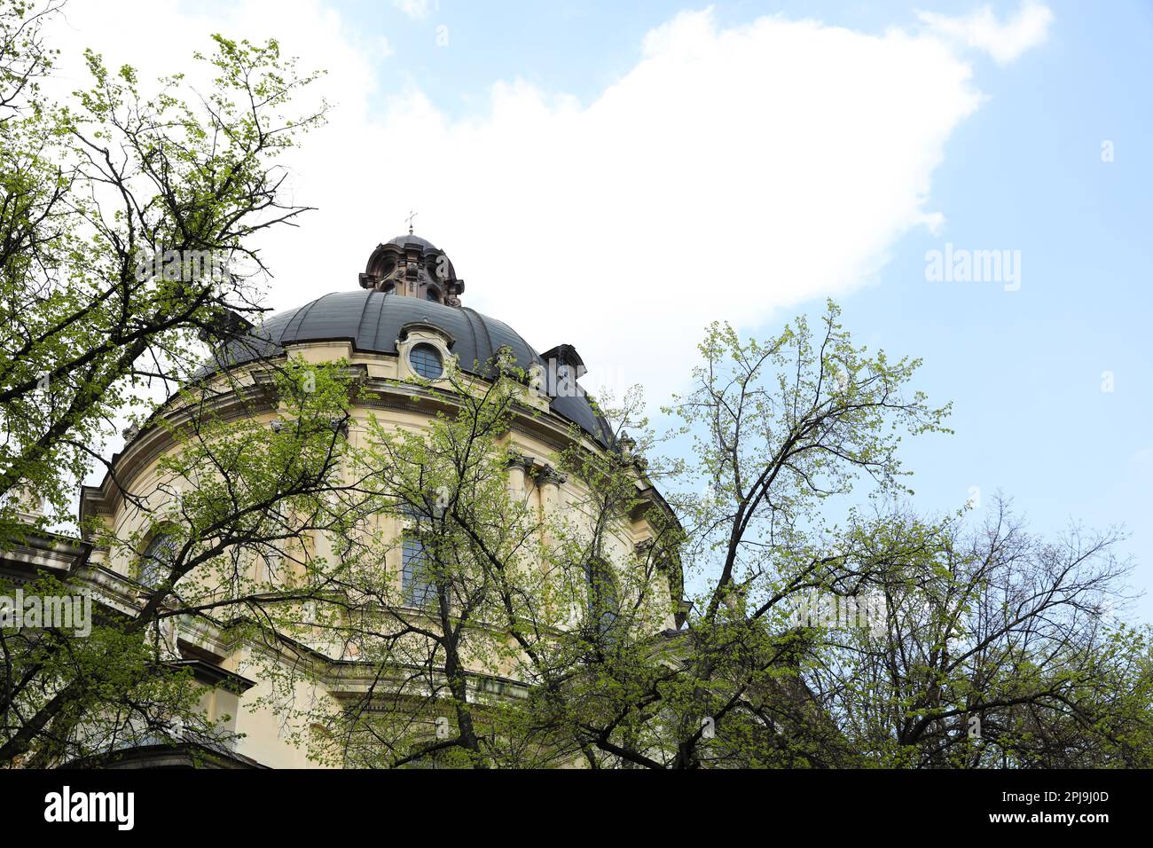 Exterior of beautiful cathedral against blue sky, low angle view Stock ...