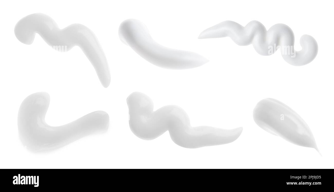 Set with smears of toothpaste on white background Stock Photo - Alamy