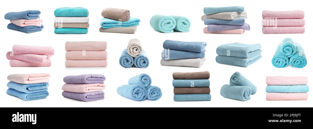 Set of folded and rolled colorful towels on white background. Banner ...