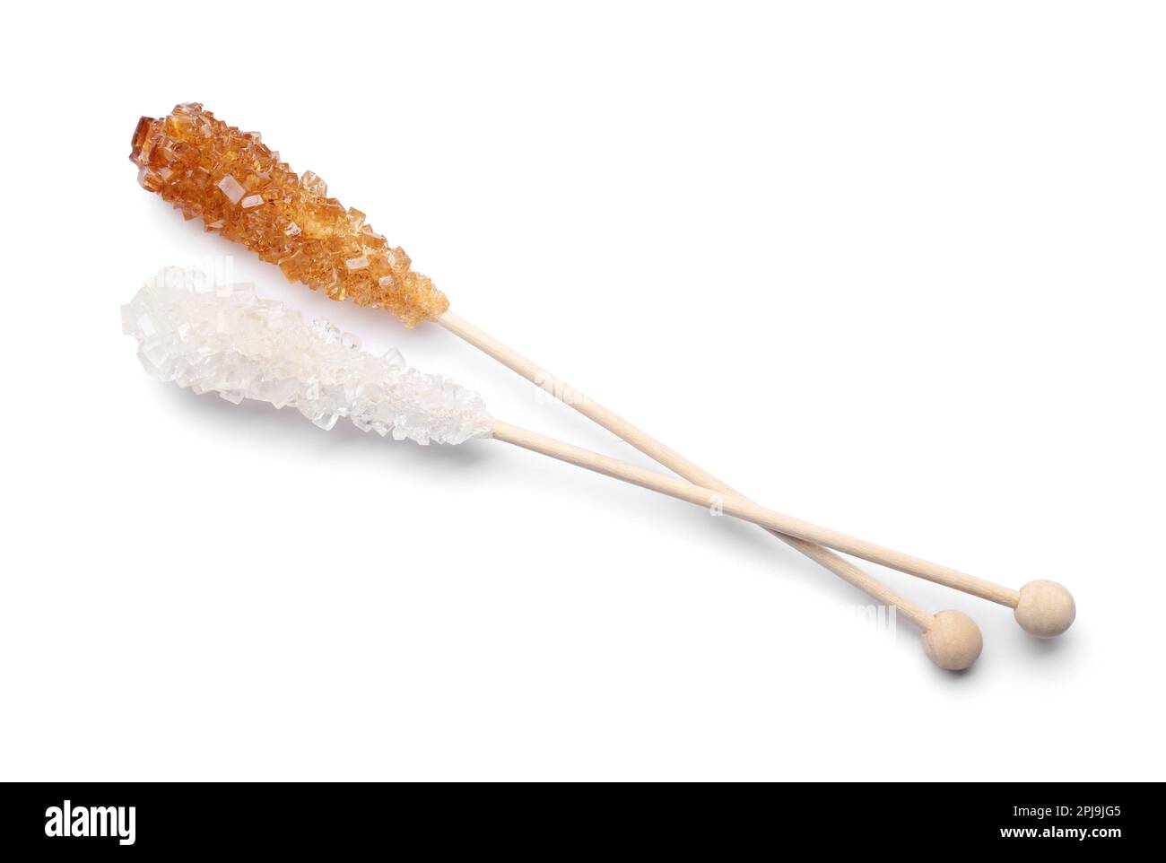 Wooden sticks with sugar crystals isolated on white, top view. Tasty ...