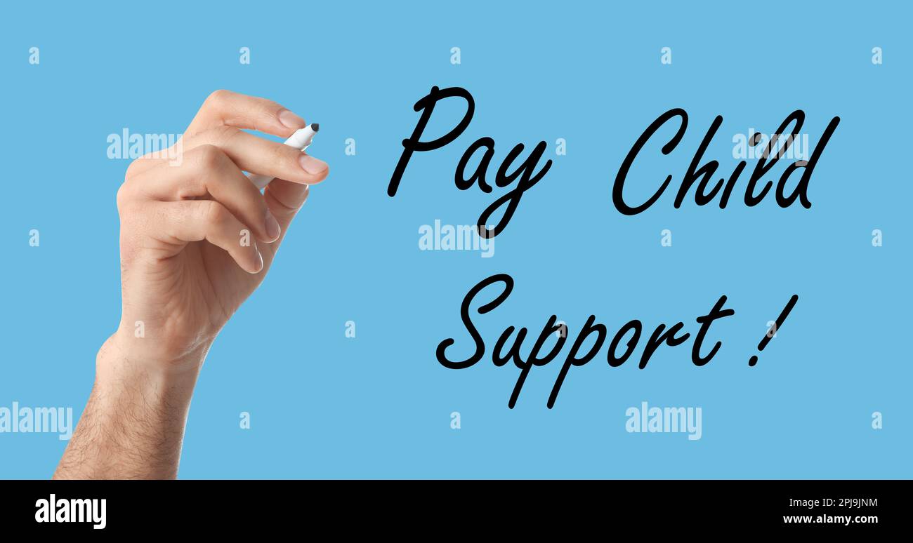 Man with marker and phrase PAY CHILD SUPPORT! on turquoise background ...