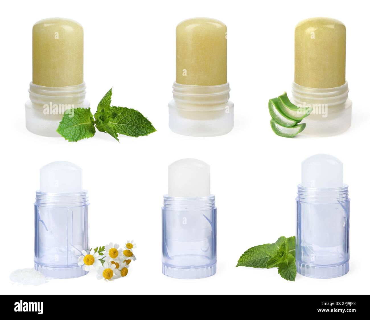 Set with different natural crystal alum deodorants on white background ...