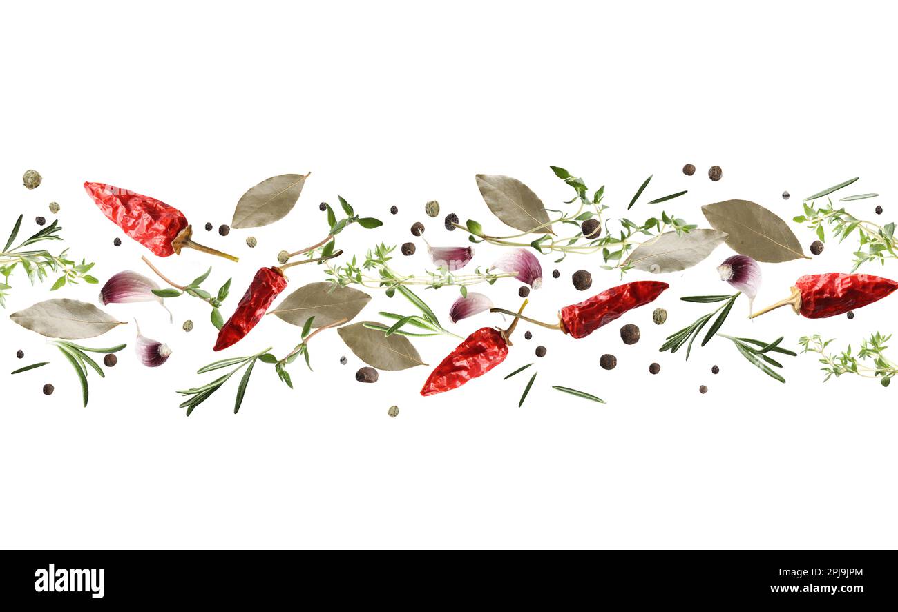 Many different spices flying on white background Stock Photo - Alamy