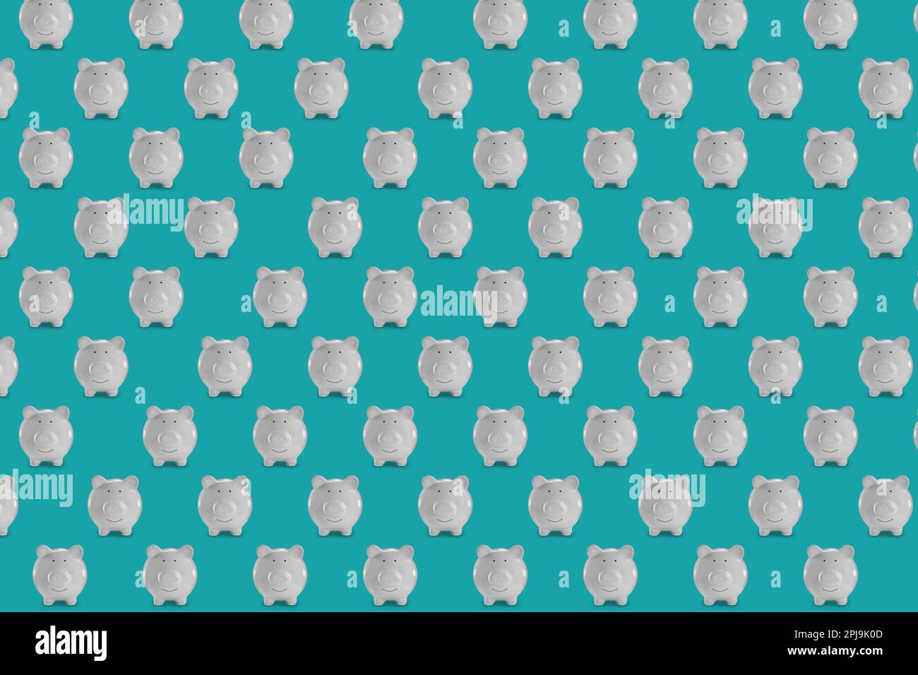 Bright piggy bank pattern on turquoise background Stock Photo - Alamy