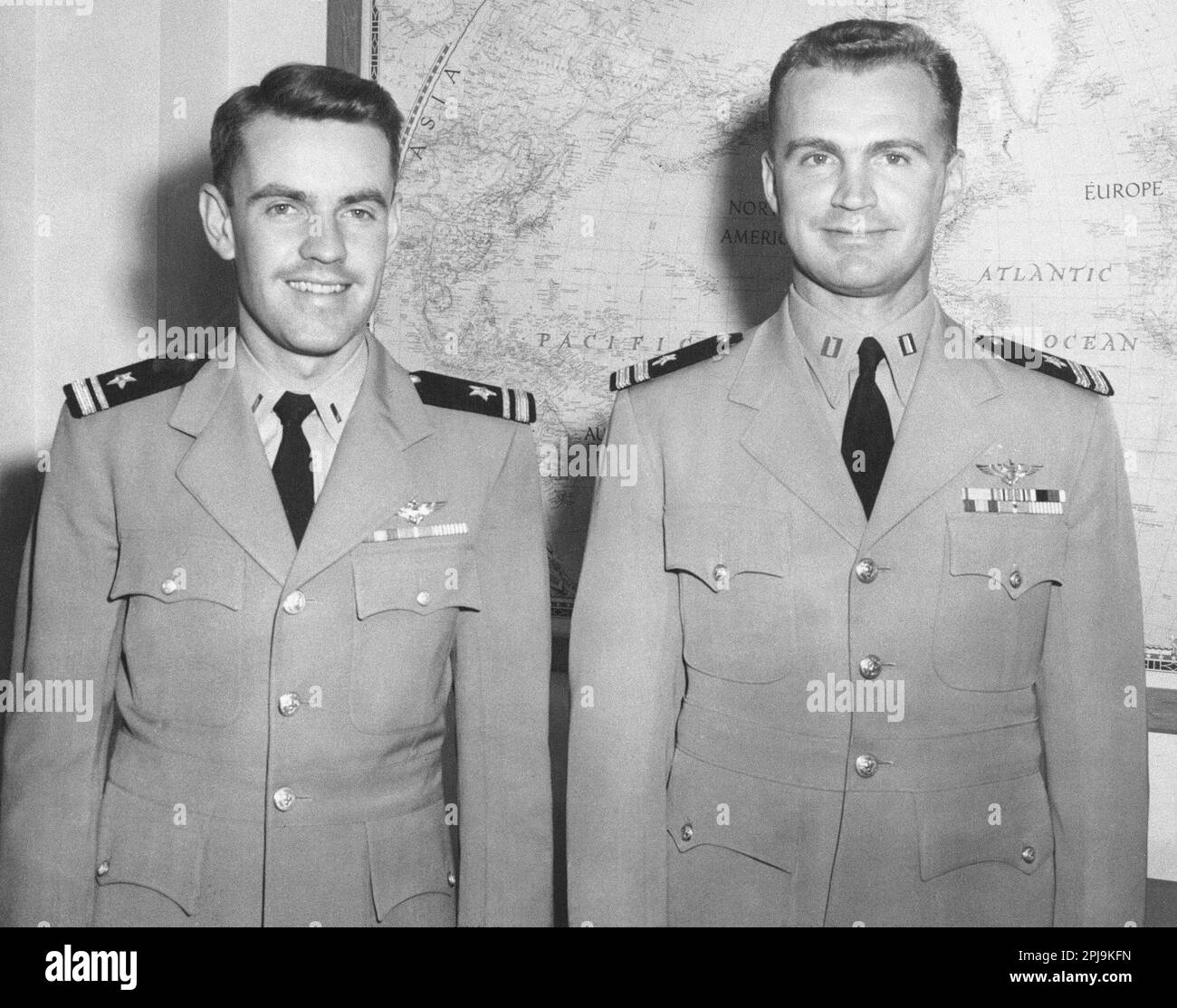 FILE - This July 15, 1955, photo shows plane commander Lt. R.H. Fischer ...