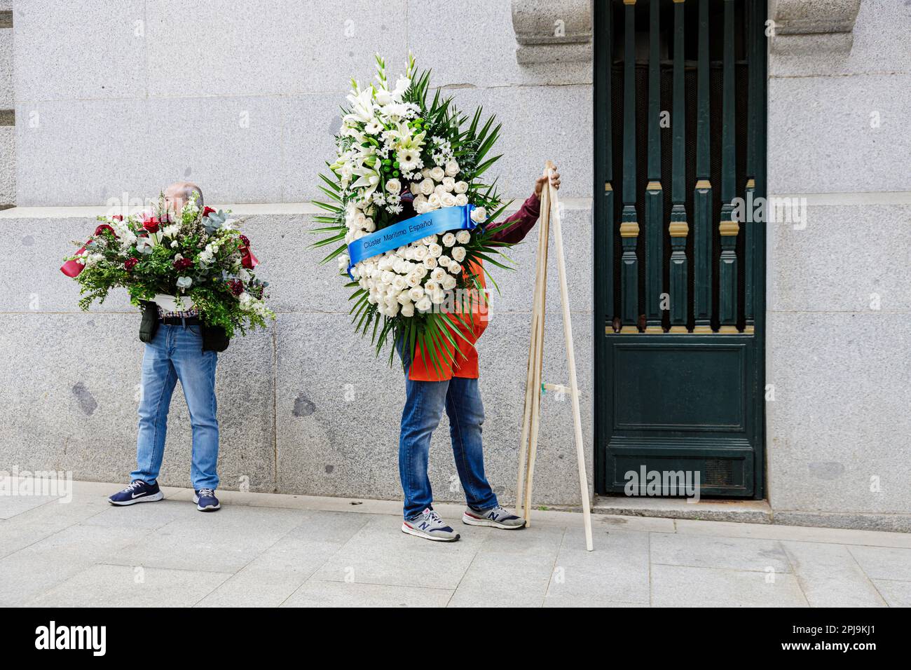 Men carry wreaths at the mortuary chapel of Admiral Antonio Martorell ...