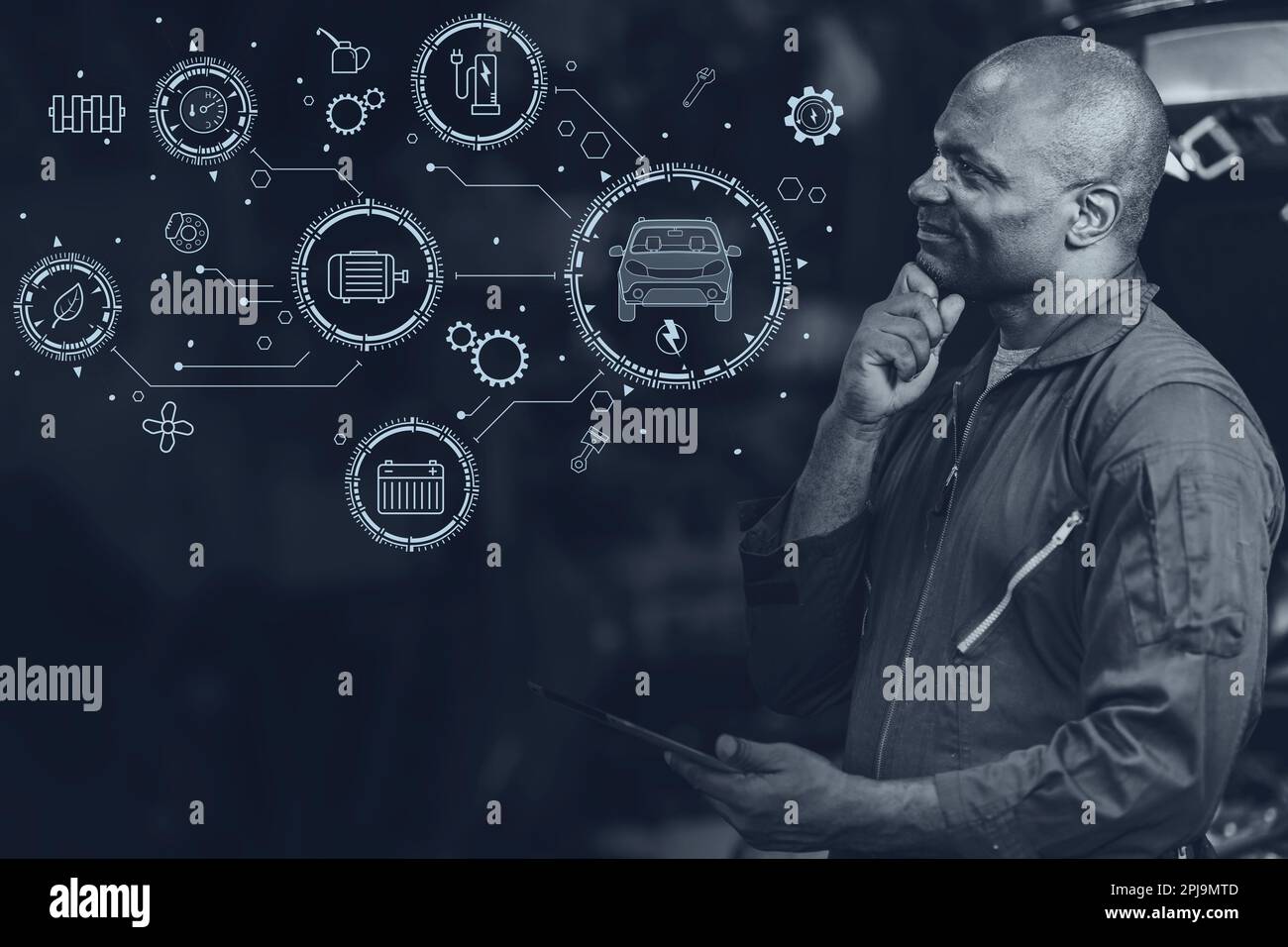 Mechanic male worker thinking with business solution for modern digital ...