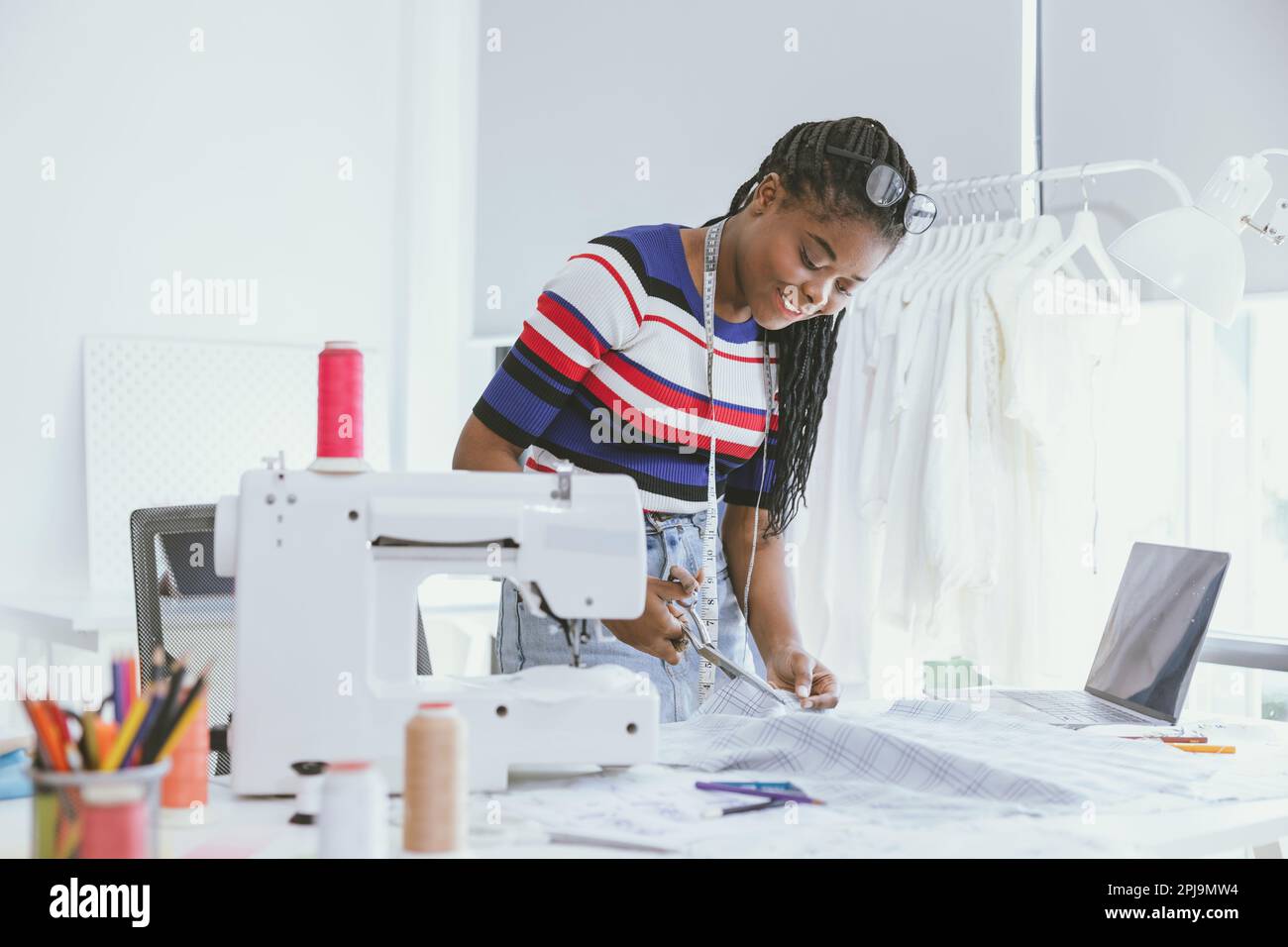 african black woman clothes designer costume artist happy working in ...