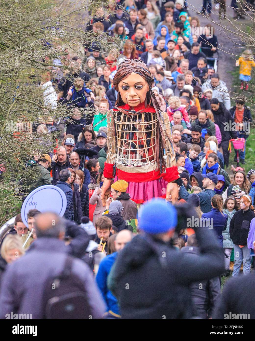 London, UK. 01st Apr, 2023. Little Amal walks up Parliament Hill ...